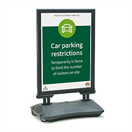 Black weatherproof pavement sign with wheels