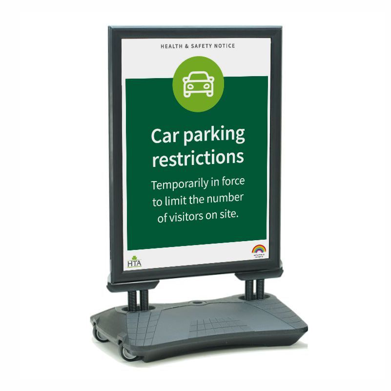 Black weatherproof pavement sign with wheels